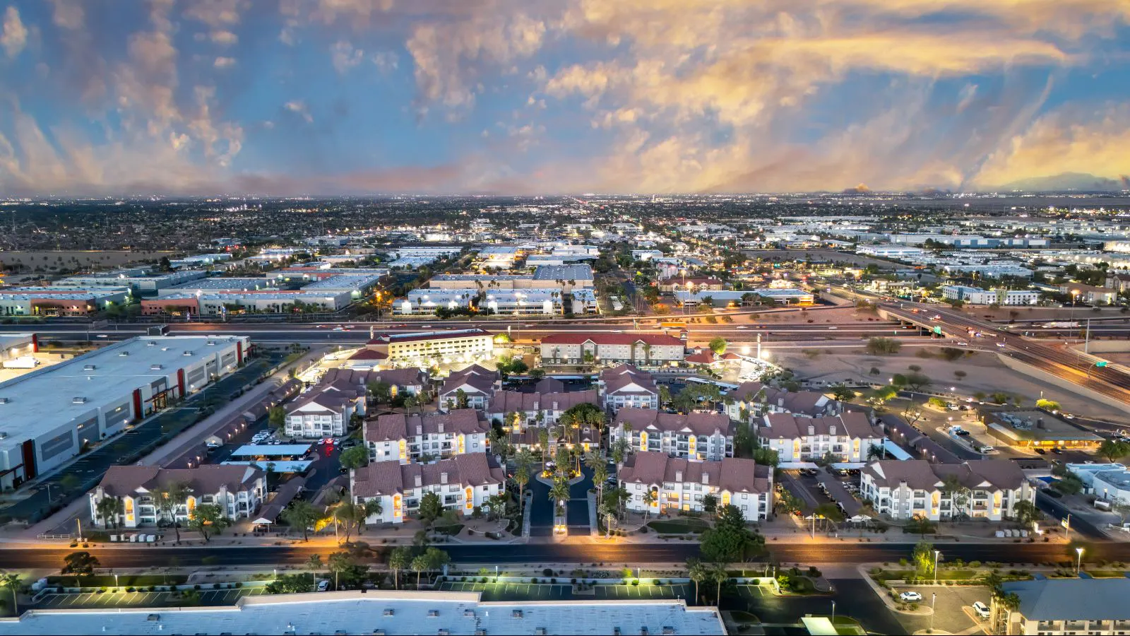 Aerial view showcasing the surrounding neighborhood and city skyline.